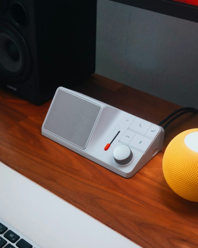 Are there any voice control options available for a cone media player?